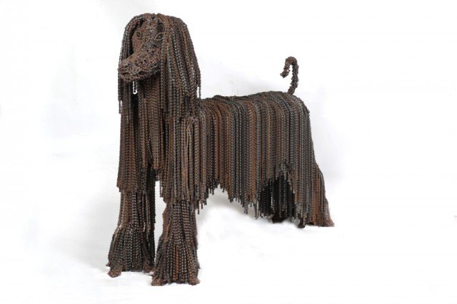"Unchained": A collection of dog sculptures made out of recycled ...